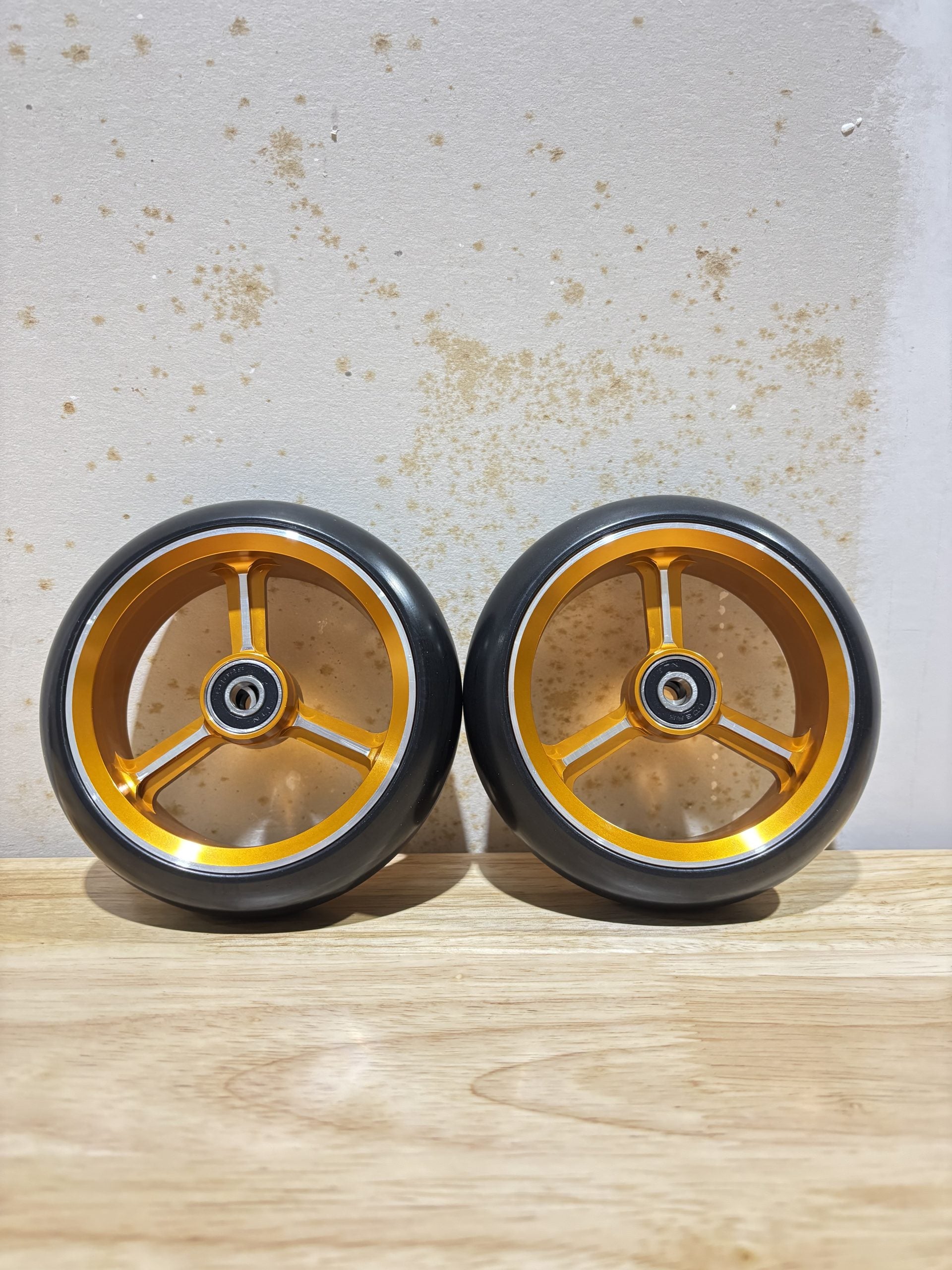 Custom 5" x 1.4" Wide Softroll Casters (pair)- Orange/Copper Anodized ...